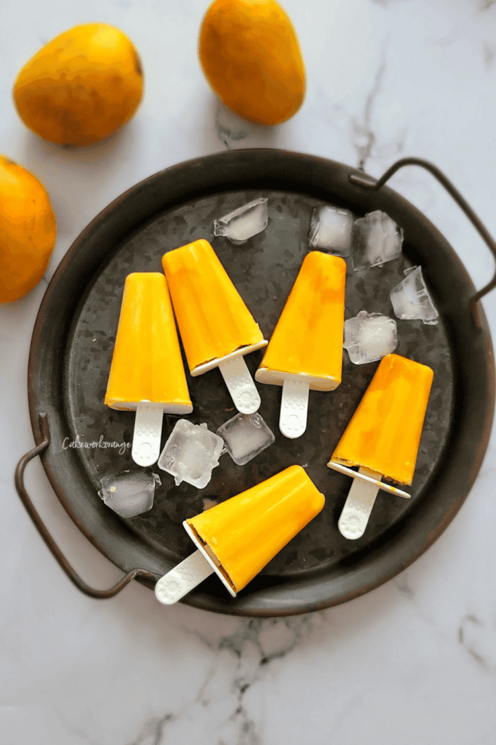 Creamy Mango Popsicles - Cakeworkorange