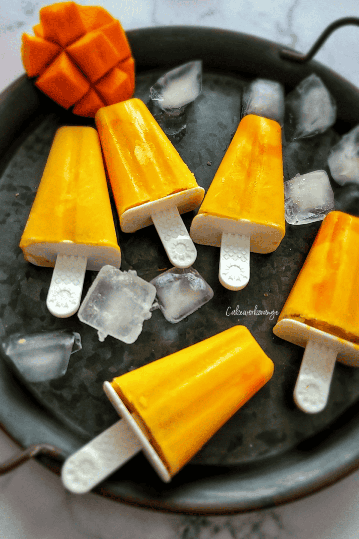 Creamy Mango Popsicles - Cakeworkorange